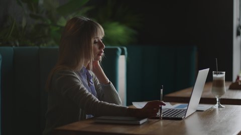 Asian Woman Sits Brooding Looks Laptop Stock Footage Video (100% ...