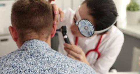 Otorhinolaryngologist Frontal Reflector On Forehead Examining Stock ...