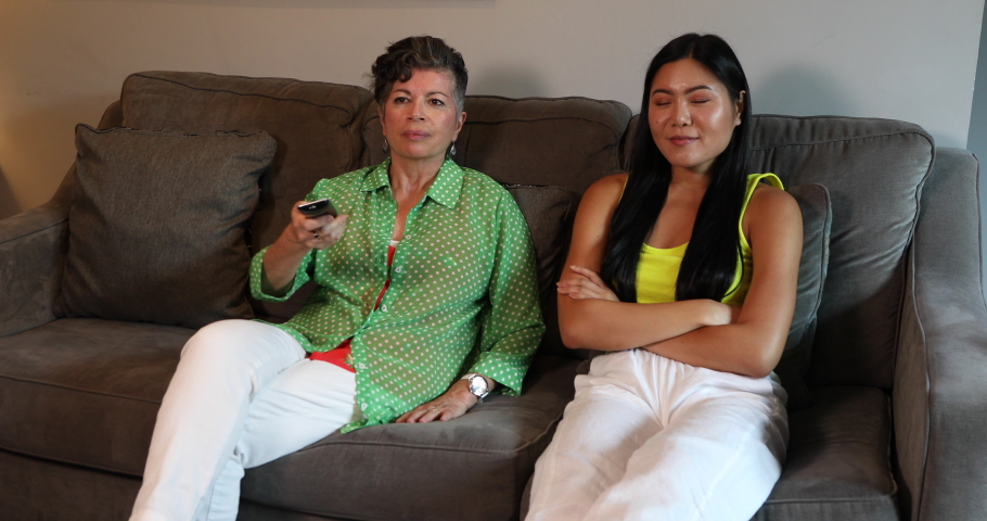 two friends argue over changing channels Stock Footage Video (100% ...