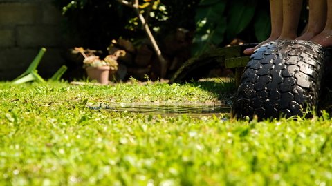 Siblings Splash Into Mud Puddle Together Stock Footage Video (100% ...