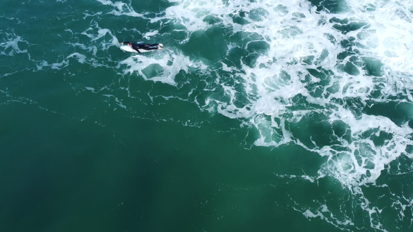 aerial view unrecognizable male surfer lying Stock Footage Video (100% ...