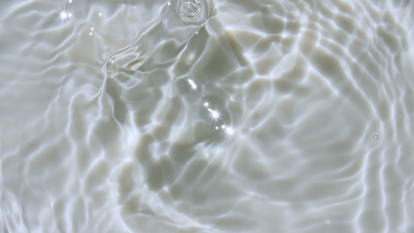 water splash drop creating ripple pure Stock Footage Video (100% ...