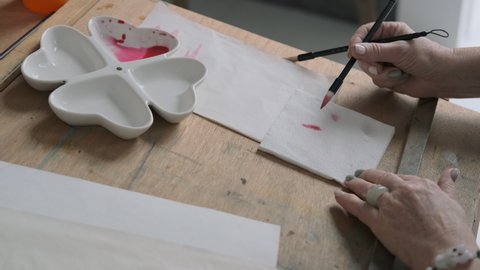 Hand Senior Artist Diluting Paint On Stock Footage Video (100% Royalty ...