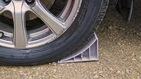 Caucasian Person Placing Removing Wheel Chock Stock Footage Video (100% ...