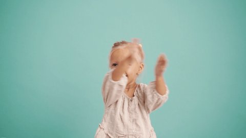 Rejoicing Little Girl Clapping Hands Blue Stock Footage Video (100% ...