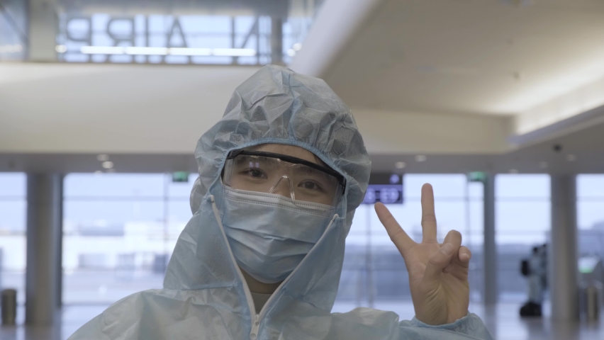 Cheerful Asian Female in Ppe Stock Footage Video (100% Royalty-free ...