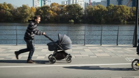 Father Running Newborn Stroller His Little Stock Footage Video (100% ...