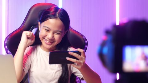 Asian Kid Girl Playing Video Game Stock Footage Video (100% Royalty ...