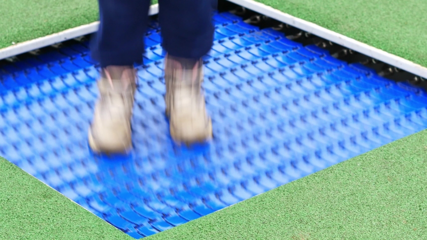 street trampoline ground playground children's feet Stock Footage Video ...