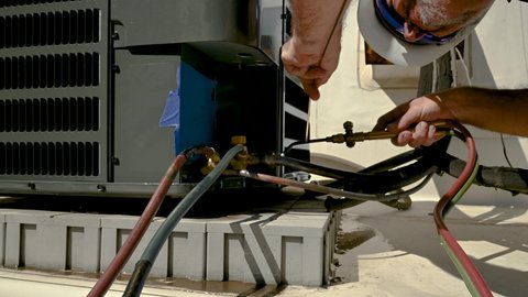 Brazing Condensing Unit On Roof Hvac Stock Footage Video (100% Royalty ...