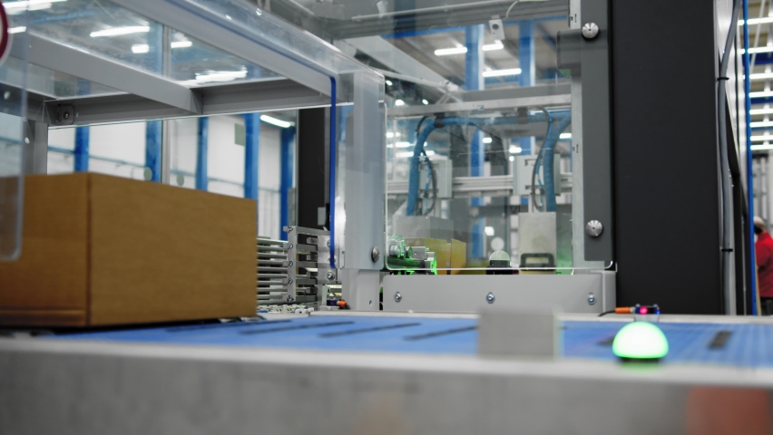 automated packaging factory innovative assembly line Stock Footage ...