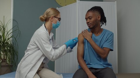 Attractive Young Adult Man Taking Vaccination Stock Footage Video (100% ...