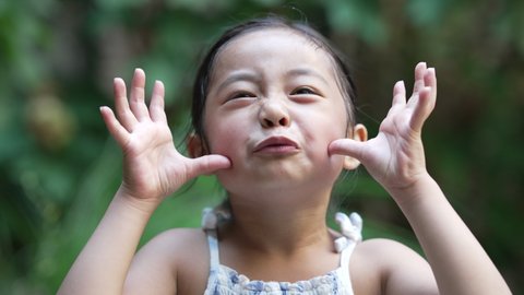 Little girl silly face Stock Video Footage - 4K and HD Video Clips ...