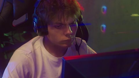 Young Gamer Intensely Staring Computer Monitor Stock Footage Video (100 ...