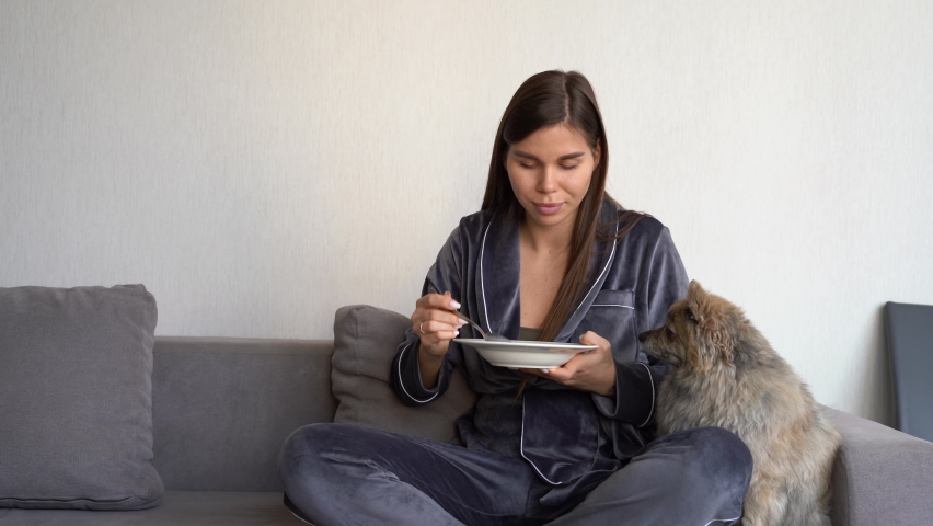 Woman eating corn dog Stock Video Footage - 4K and HD Video Clips ...