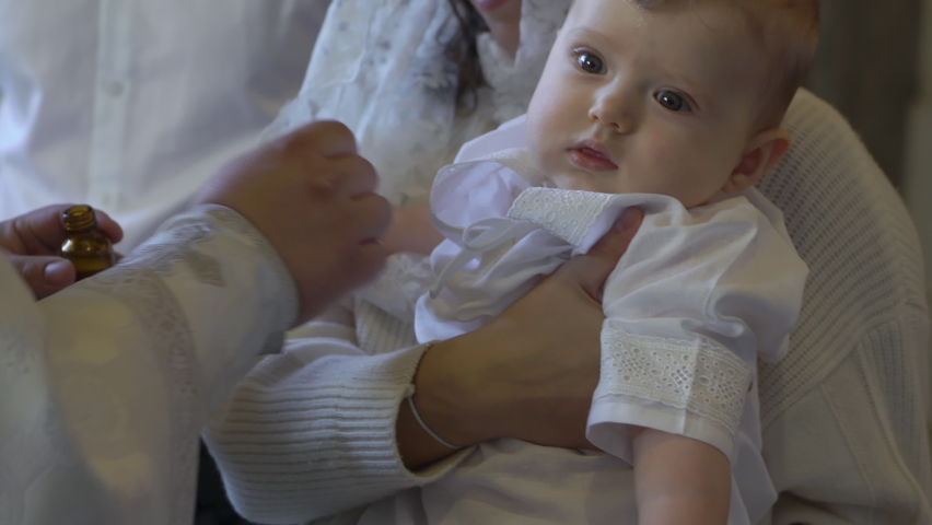 anointing oil baptismal ceremony child boy Stock Footage Video (100% ...