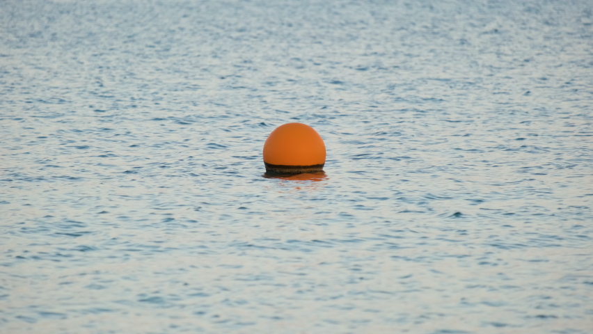 Orange Buoy Floating On Sea Surface Stock Footage Video (100% Royalty ...