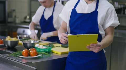 Unrecognizable Chef Apron Writing New Recipe Stock Footage Video (100% ...