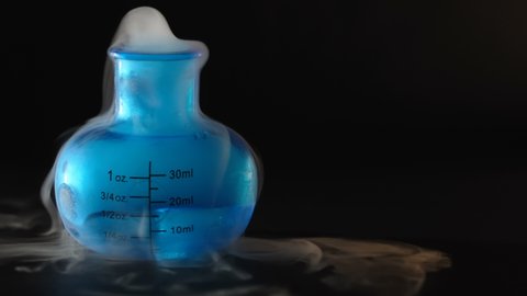 White Smoke Coming Out Blue Beaker Stock Footage Video (100% Royalty ...