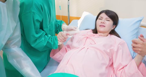 122 Asian woman giving birth Stock Video Footage - 4K and HD Video ...