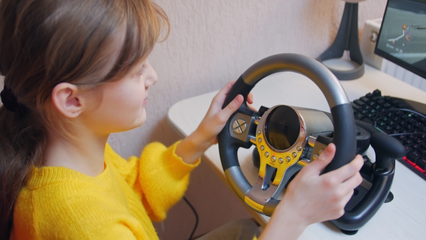 girl playing races on wheel side Stock Footage Video (100% Royalty-free ...