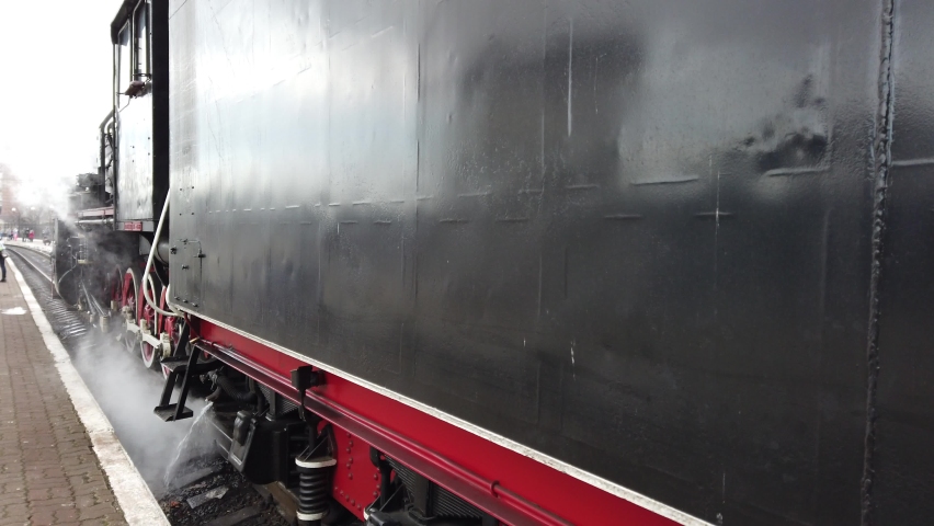 retro steam locomotive prepares leave station Stock Footage Video (100% ...