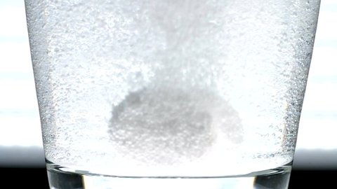 Antacid Tablets Dissolving Backlit Glass Water Stock Footage Video (100 ...