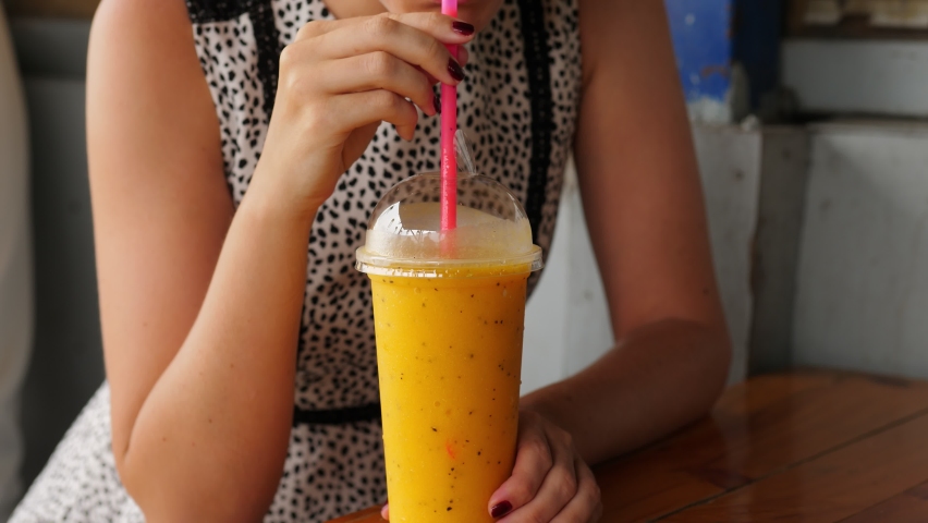 Mango shake plastic cup Stock Video Footage - 4K and HD Video Clips ...