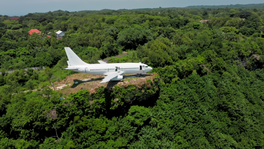 airplane on edge cliff green tropical Stock Footage Video (100% Royalty ...