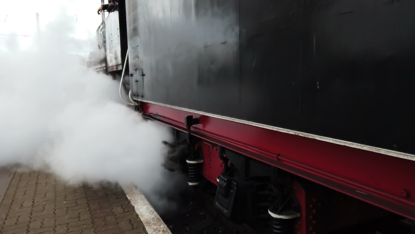 retro steam locomotive prepares leave station Stock Footage Video (100% ...