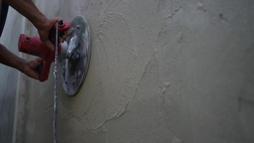 Construction Worker Working Using Automatic Plastering Stock Footage ...