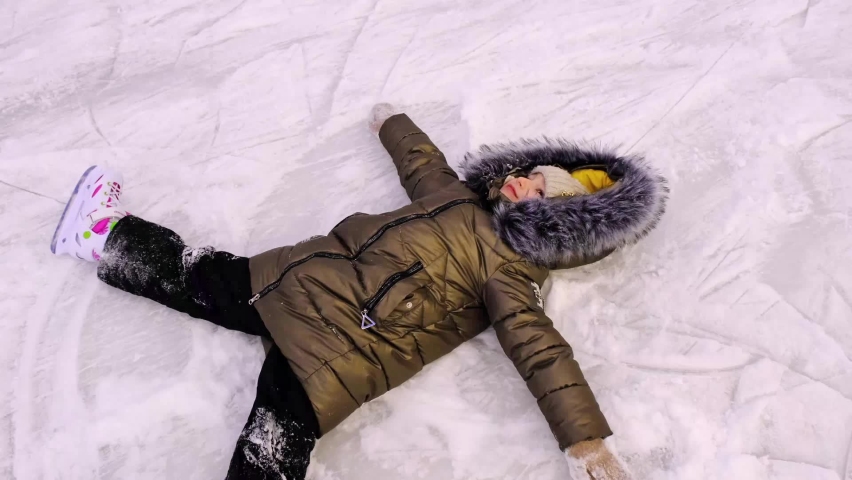 little girl lying on ice skates Stock Footage Video (100% Royalty-free ...