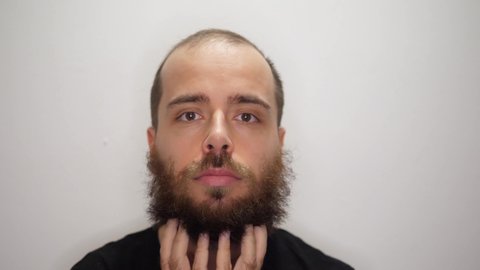 341 Scratch his beard Stock Video Footage - 4K and HD Video Clips ...