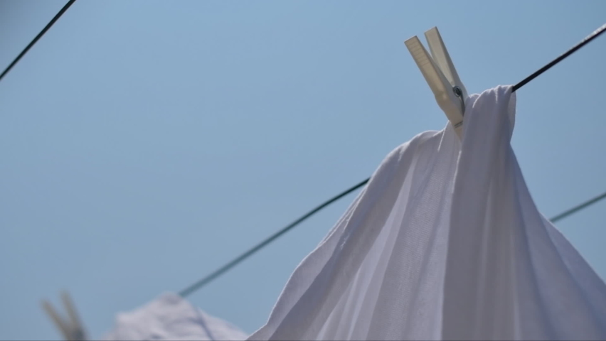 182 Sheets drying in the sun Stock Video Footage - 4K and HD Video ...