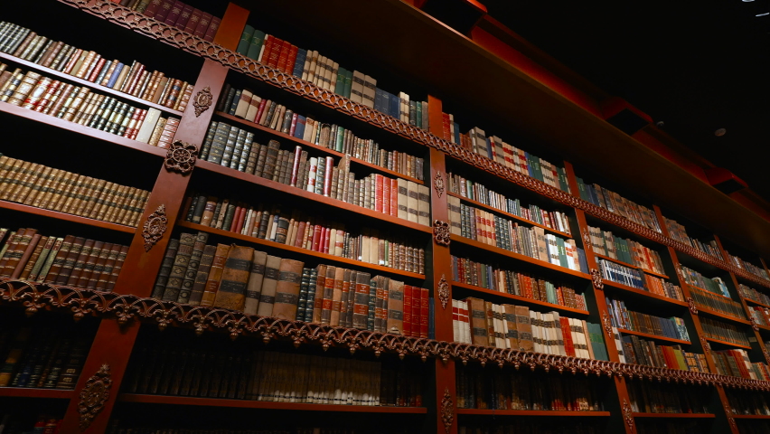 Wall book rack Stock Video Footage - 4K and HD Video Clips | Shutterstock