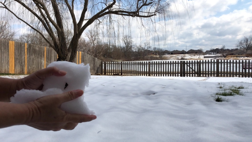 hands woman crumbling snow backyard Stock Footage Video (100% Royalty ...