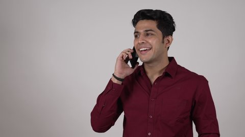 Cute Happy Young Indian Man Talking Stock Footage Video (100% Royalty ...