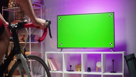 Sportsman Riding Bicycle Watching Tv Green Stock Footage Video (100% ...
