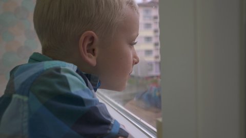 Boy Looking Out Window Waiting Parents Stock Footage Video (100% ...