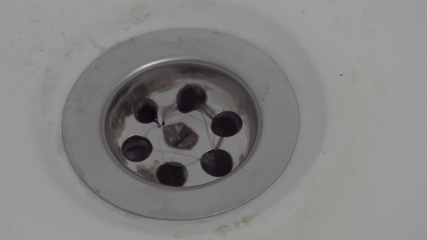 sink plug hole water draining close Stock Footage Video (100% Royalty ...