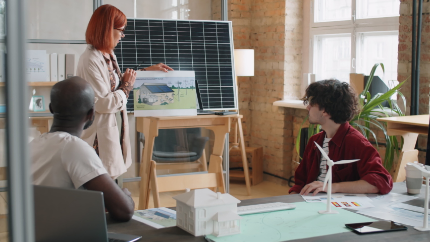 female engineer showing plan house renewable Stock Footage Video (100% ...