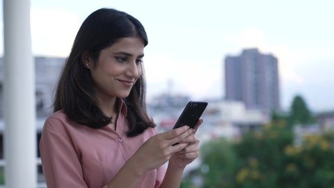 Young Indian Woman Standing Chatting Texting Stock Footage Video (100% ...
