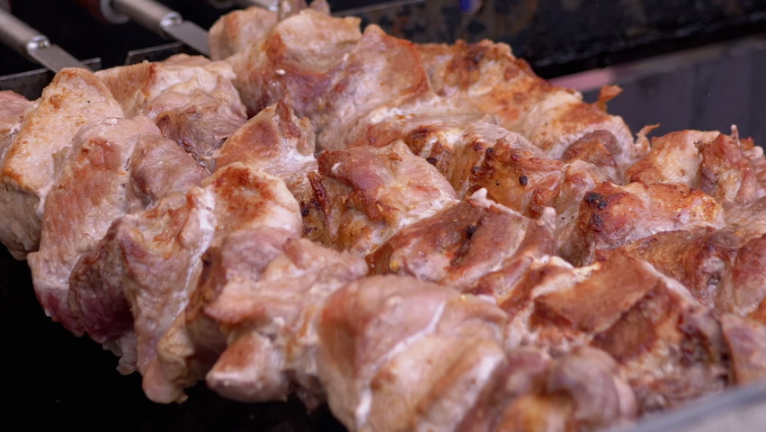 juicy crispy kebab cooking on metal Stock Footage Video (100% Royalty ...