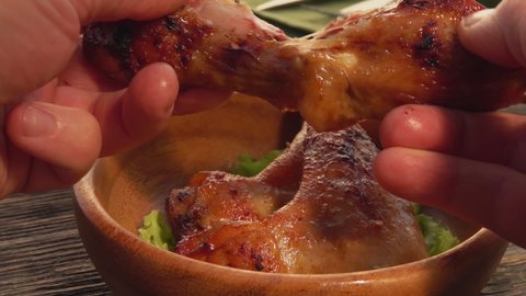 Closeup Hand Ripping Grilled Chicken Wing Stock Footage Video (100% ...