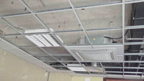 Construction Worker Performs Suspended Ceiling Maintenance Stock ...