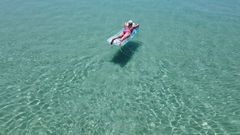 Aerial Scene Young Woman Lying Float Stock Footage Video (100% Royalty ...