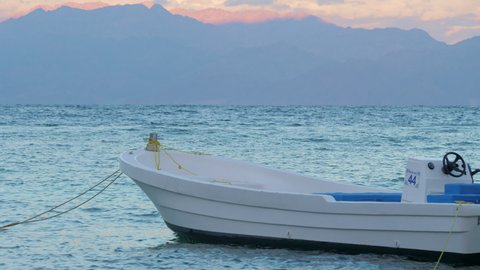 Empty White Motorboat Rocking On Red Stock Footage Video (100% Royalty ...