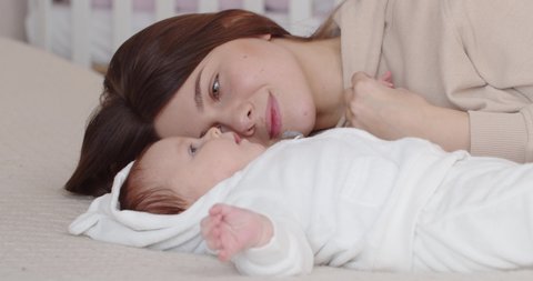 Maternal Love Caring Mother Smiles Newborn Stock Footage Video (100% ...