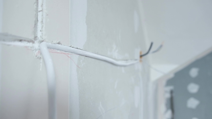 wires sticking out wall electrical wiring Stock Footage Video (100% ...