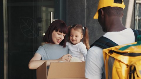 Courier Bring Parcel Little Girl Mom Stock Footage Video (100% Royalty ...